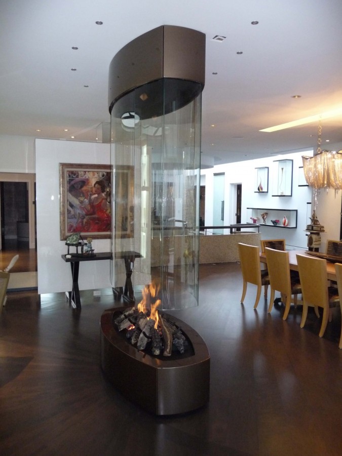 oval fireplace - contemporary fireplace - suspended fireplace